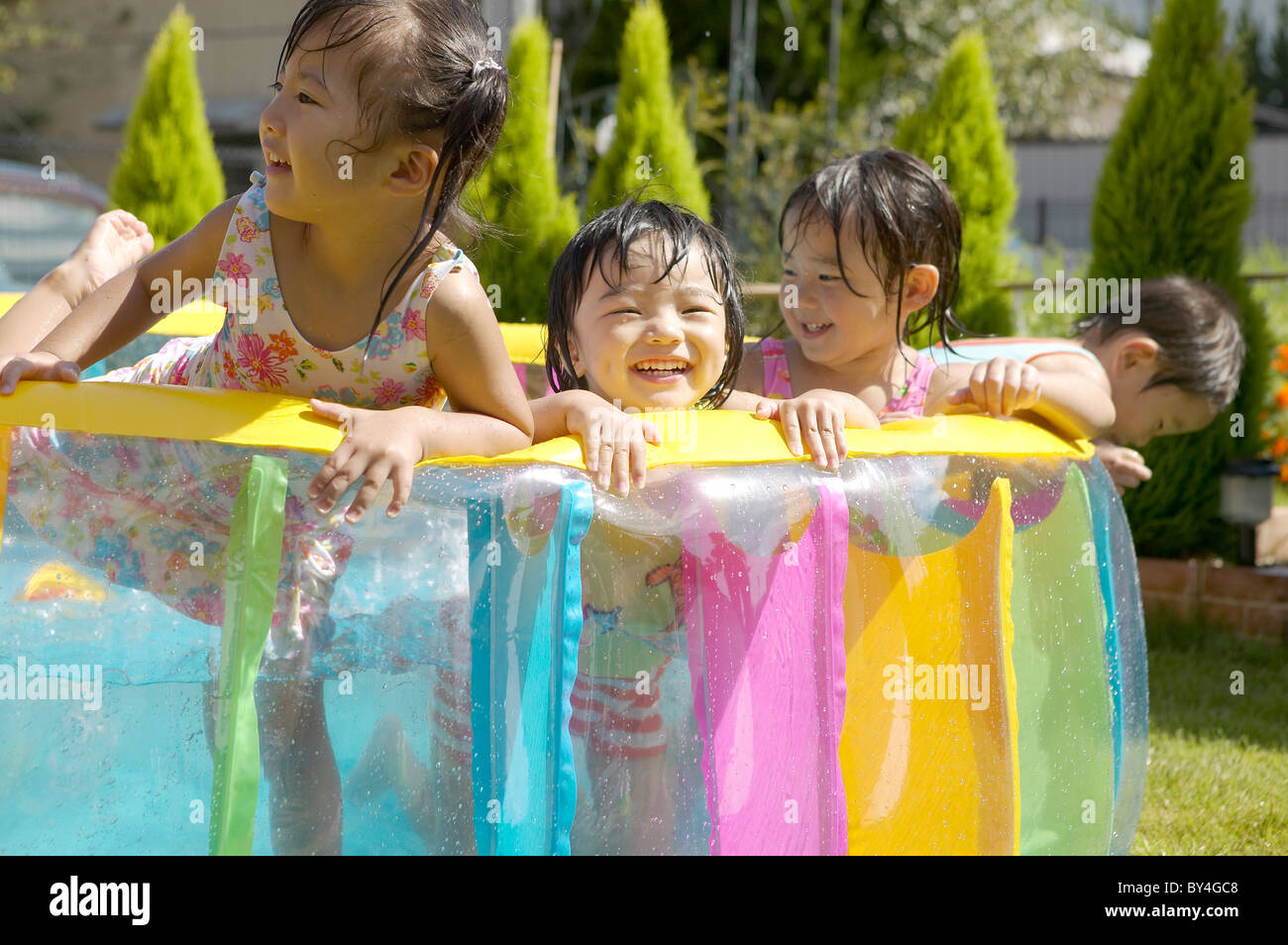 Three Children Playing Stock Photo - Alamy