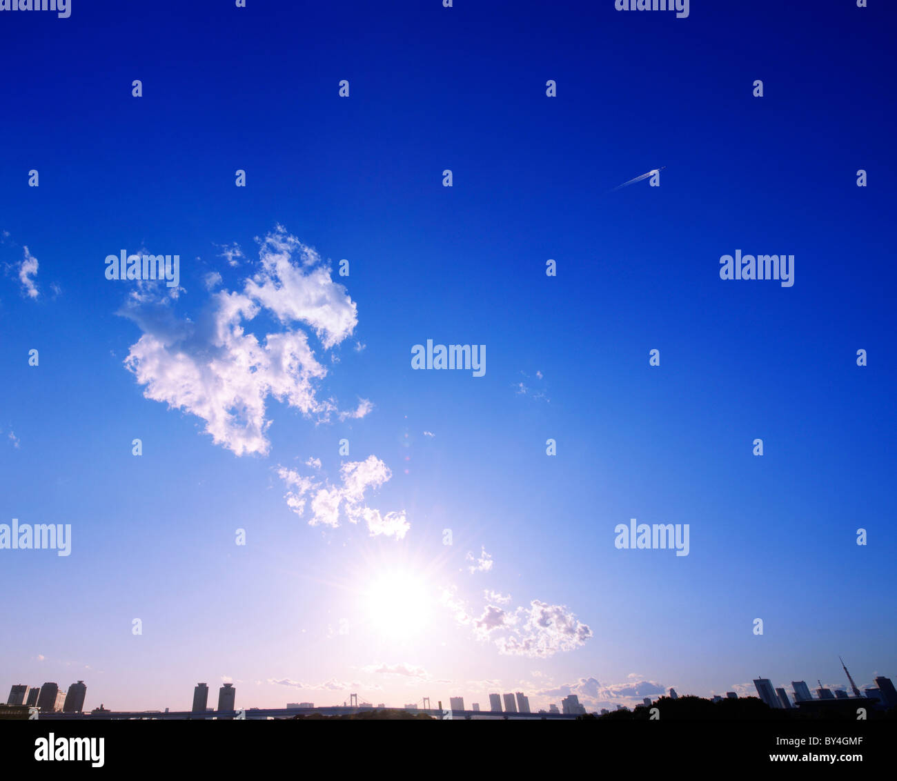Cumulus Clouds Over City Stock Photo - Alamy