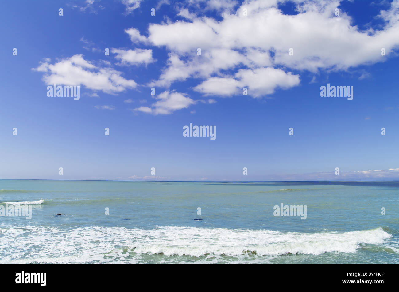 Blue Sky Over Ocean Stock Photo - Alamy