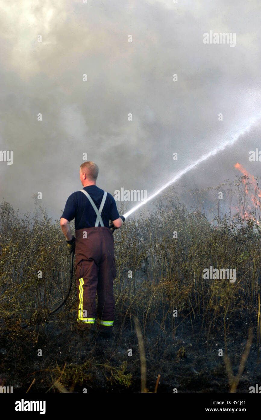 Rescue Service Firefighters Tackling High Resolution Stock Photography ...