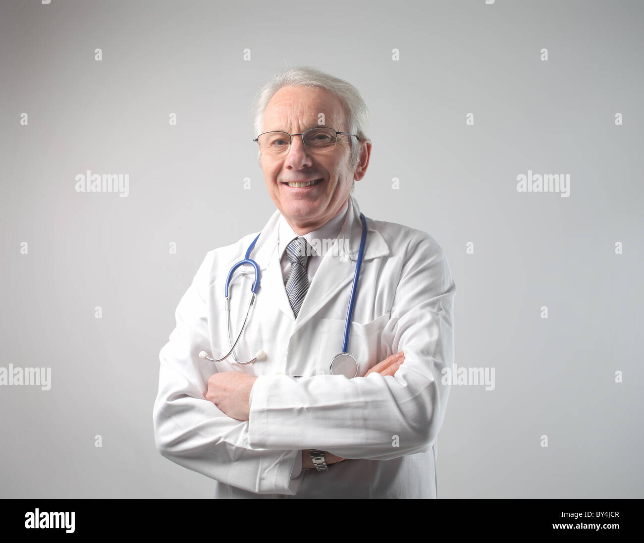 Potrait of an old doctor Stock Photo - Alamy