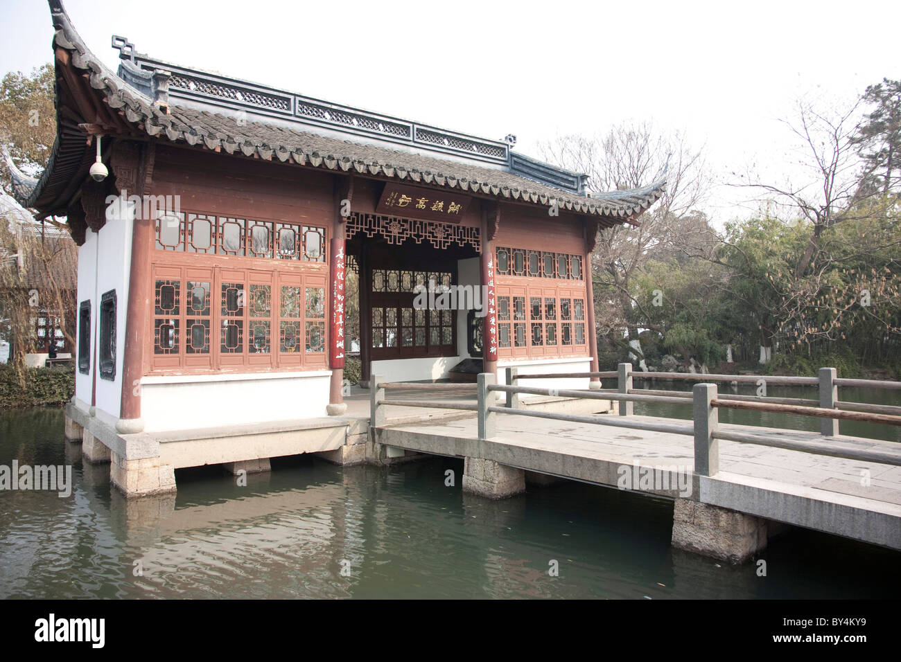 Chilly winter atmosphere of the pavilion at Three Pools Mirroring the ...