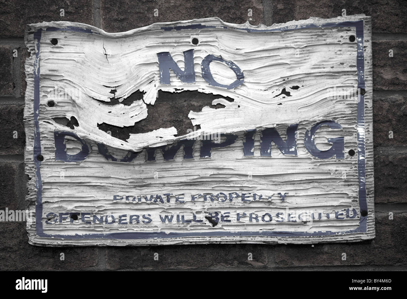 Vandalized warning sign hi-res stock photography and images - Alamy