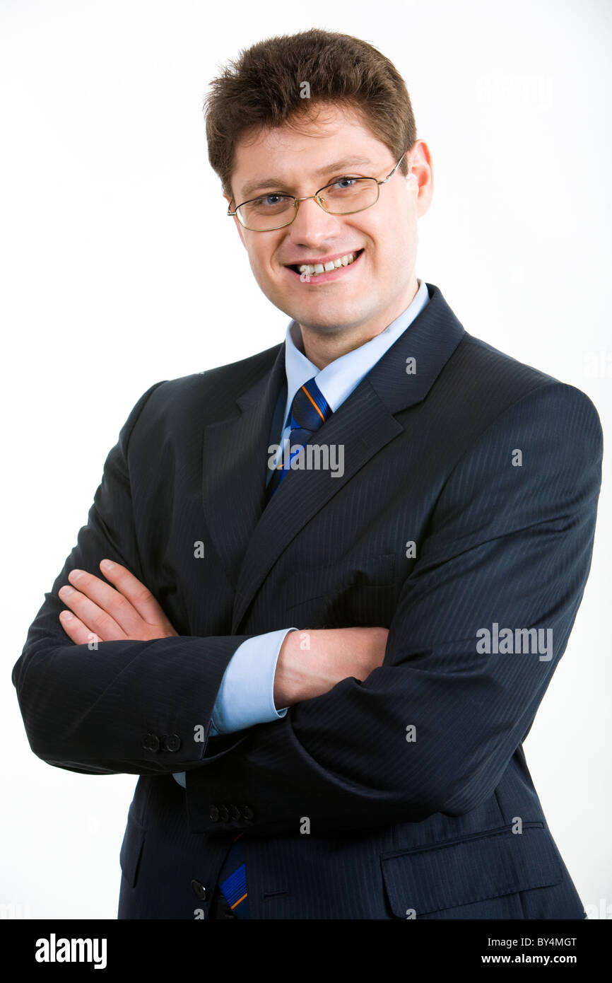 Image of confident smiling boss folding his hands Stock Photo - Alamy
