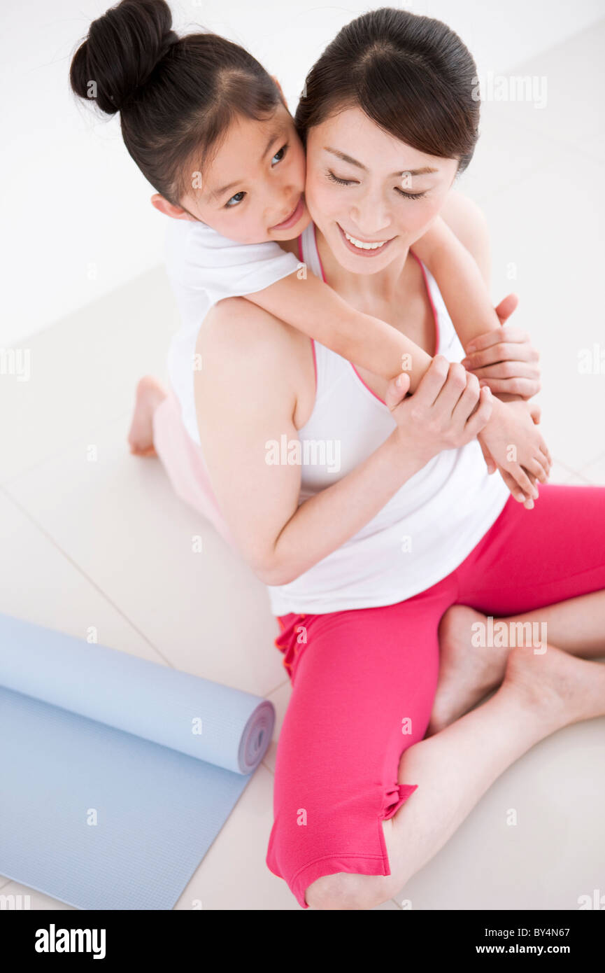 Daughter Hugging Mother Stock Photo - Alamy