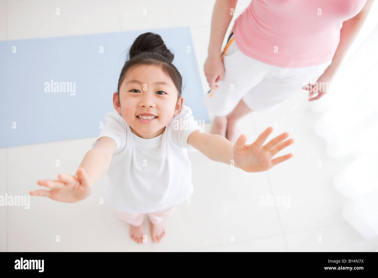 Girl Holding Arms Up Stock Photo - Alamy