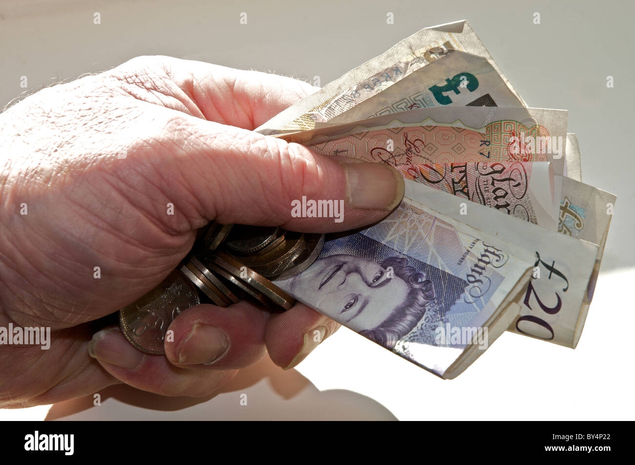 UK currency money change in hand (Fully released - photographer's own ...
