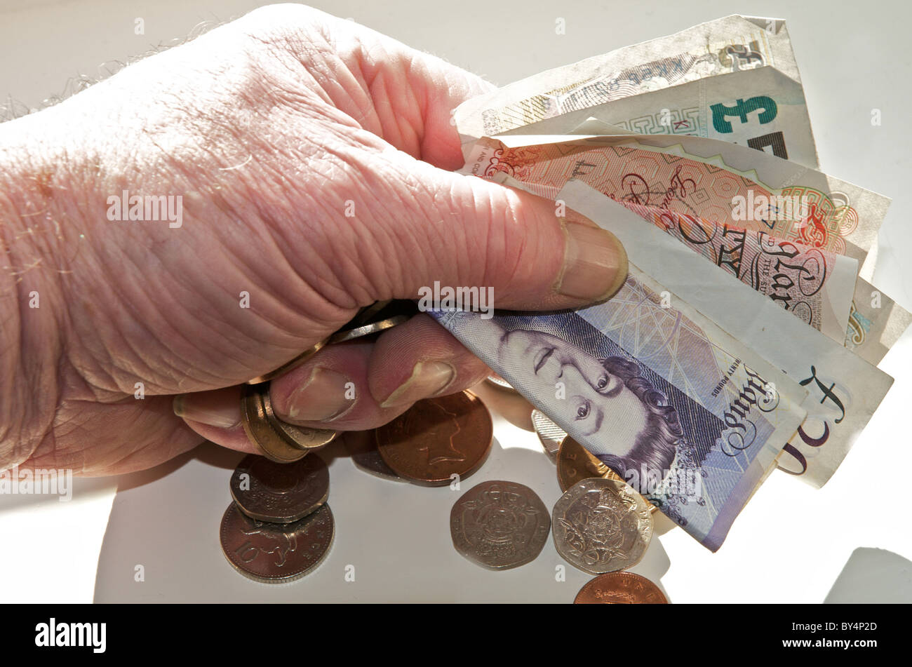UK currency money change in hand (Fully released - photographer's own ...