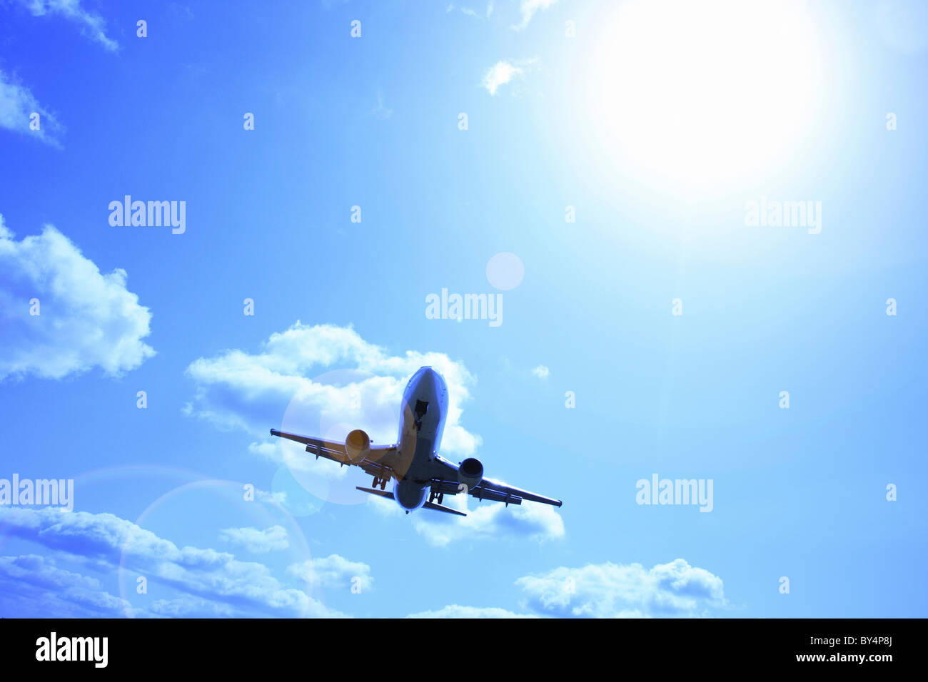 Airplane Flying Under Sky Stock Photo - Alamy