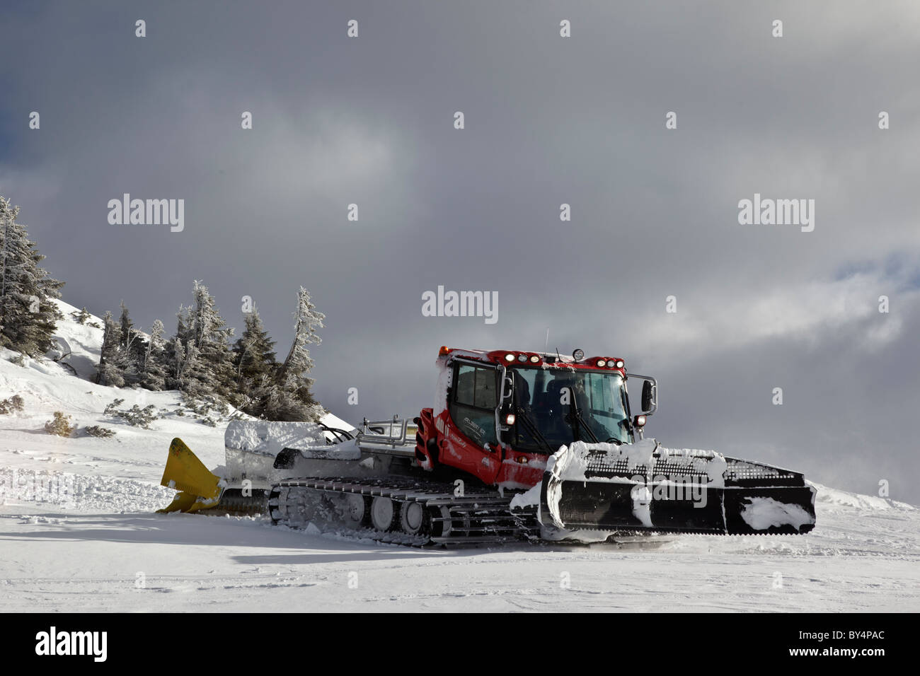 A piste basher grooming trails above St Christoph near St Anton ...
