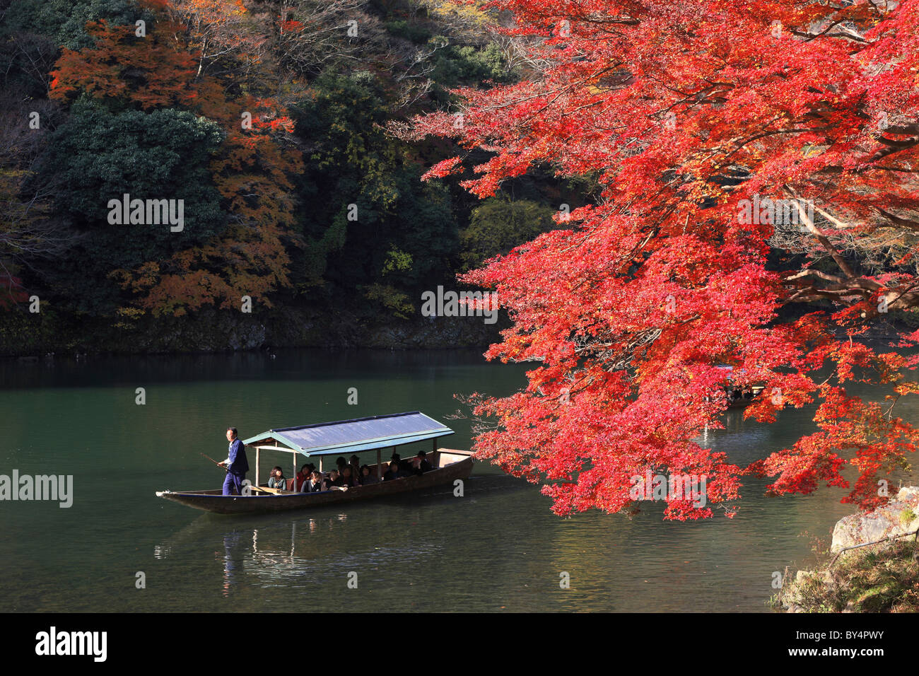 Boat going down Hozu river in Arashiyama, Kyoto Prefecture, Honshu ...