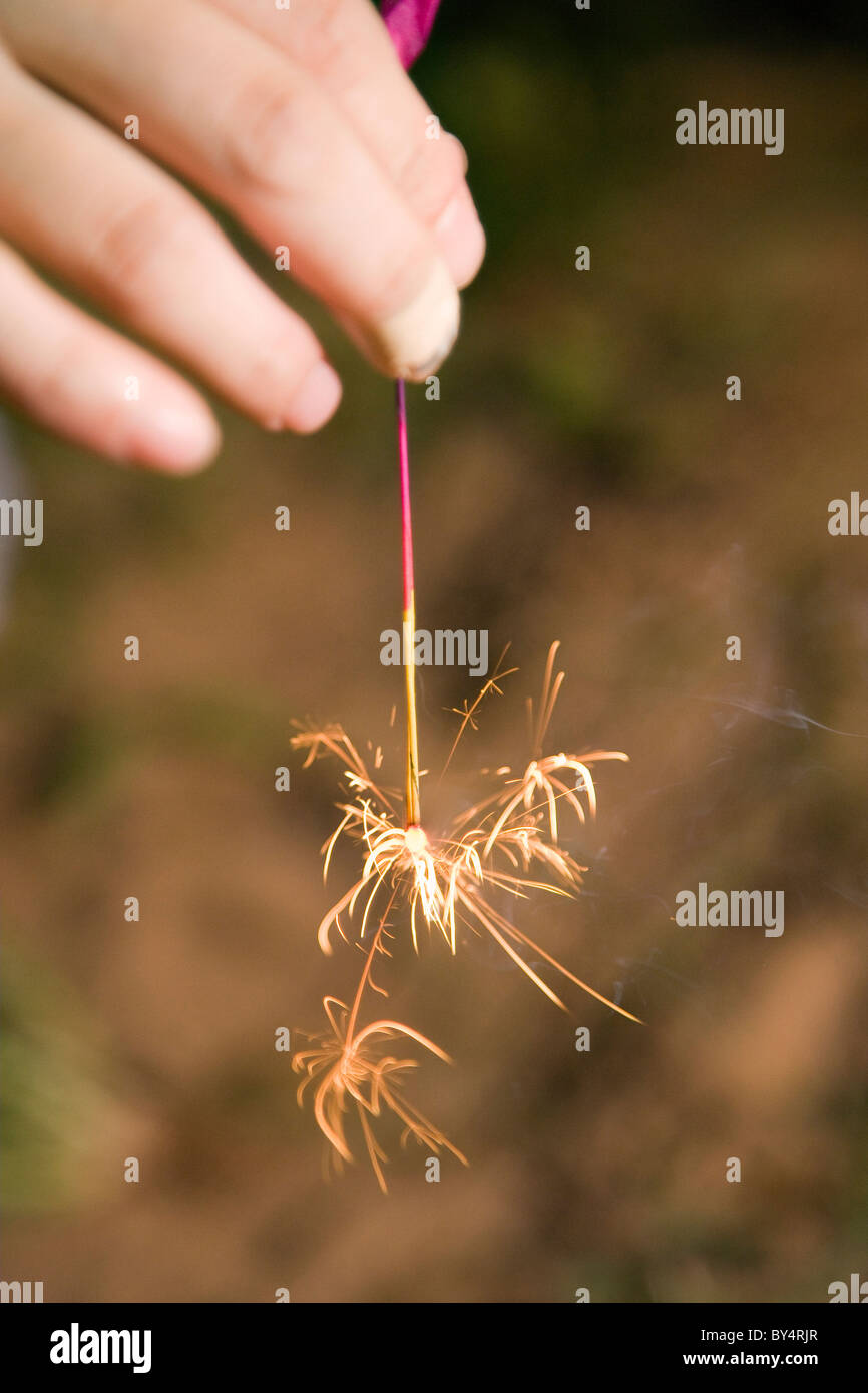 Hand holding firework, Chiba Prefecture, Honshu, Japan Stock Photo - Alamy