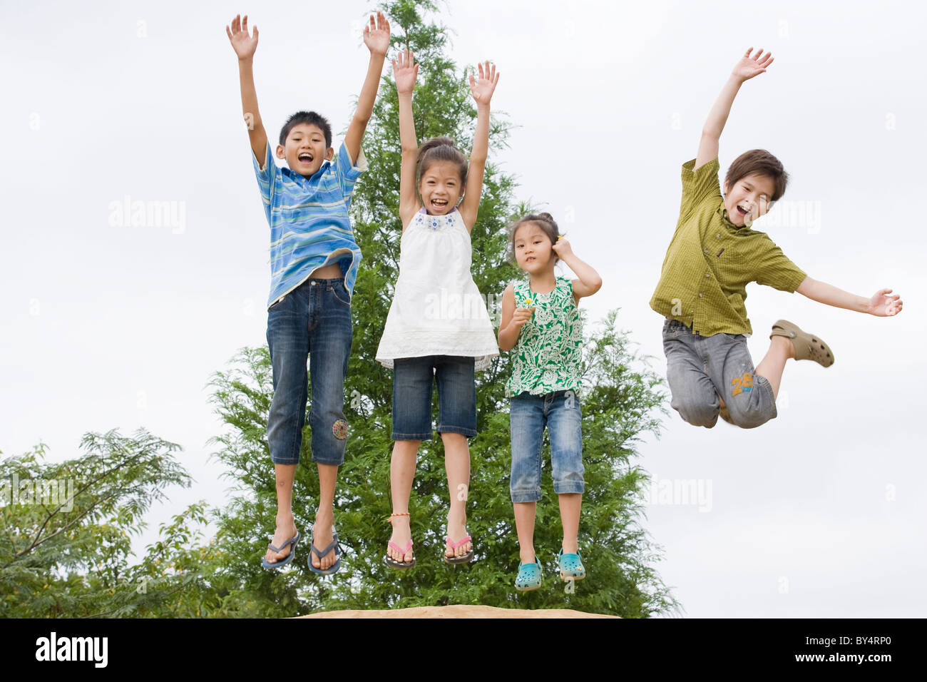 Kids jumping, Chiba Prefecture, Honshu, Japan Stock Photo - Alamy