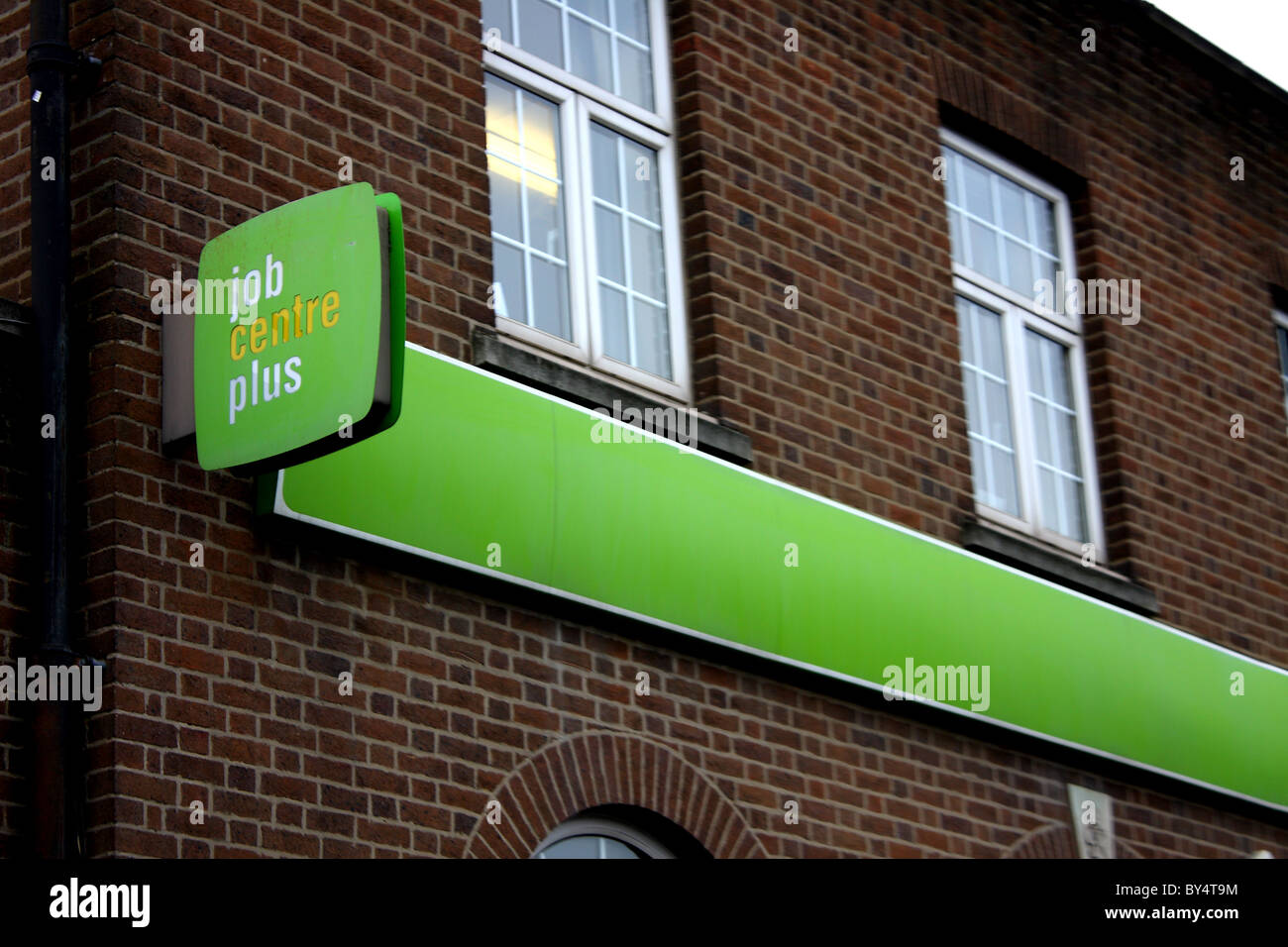 A job centre plus brick building showing their brand and logo on the ...