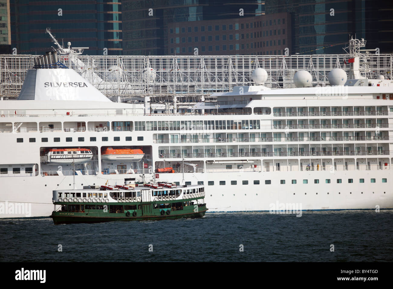 Star Ferry in front of a Cruising ship in Hong Kong Stock Photo - Alamy