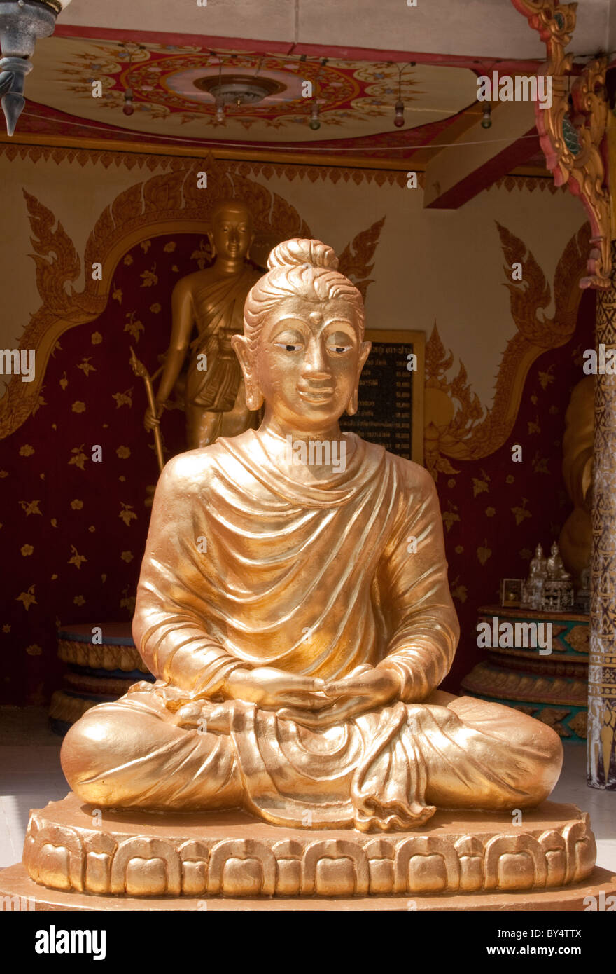Golden monk statue hi-res stock photography and images - Alamy