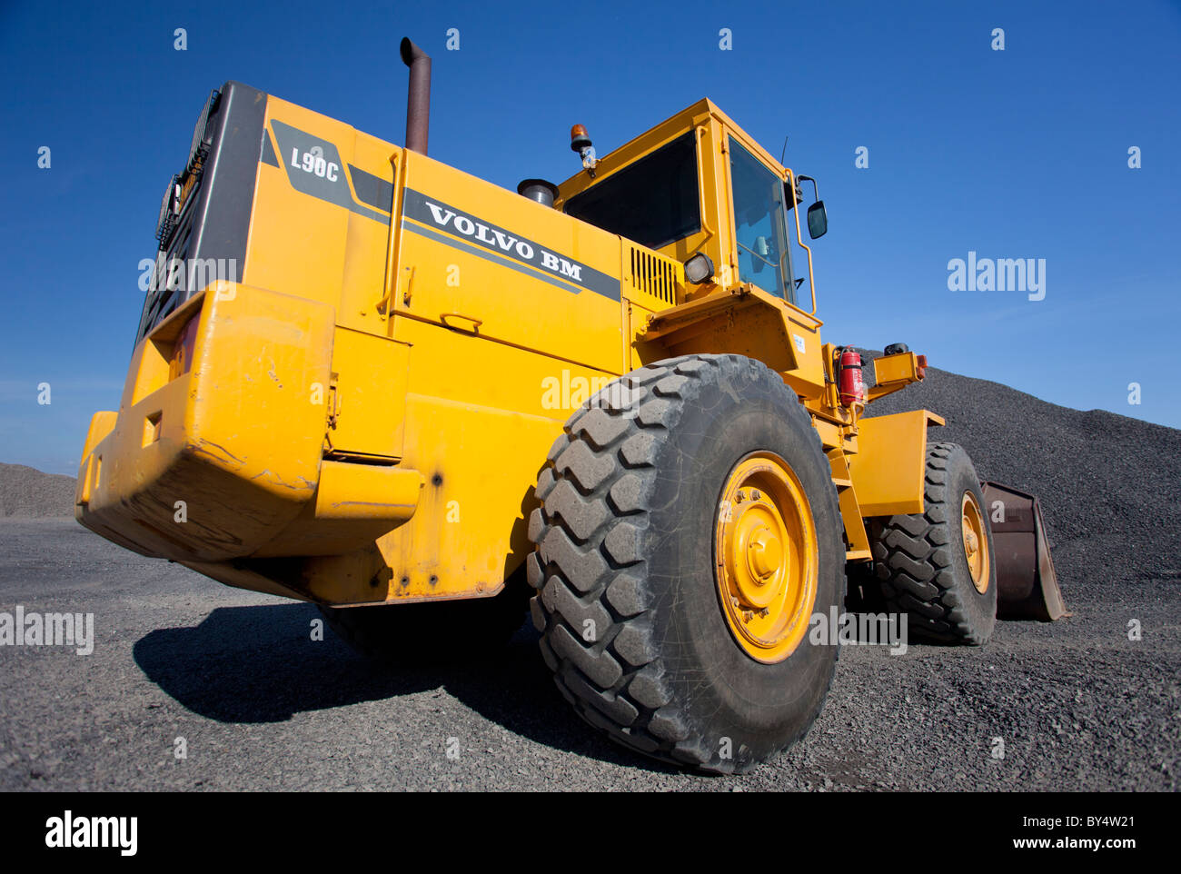 Yellow volvo bm l90c front loader hi-res stock photography and images ...