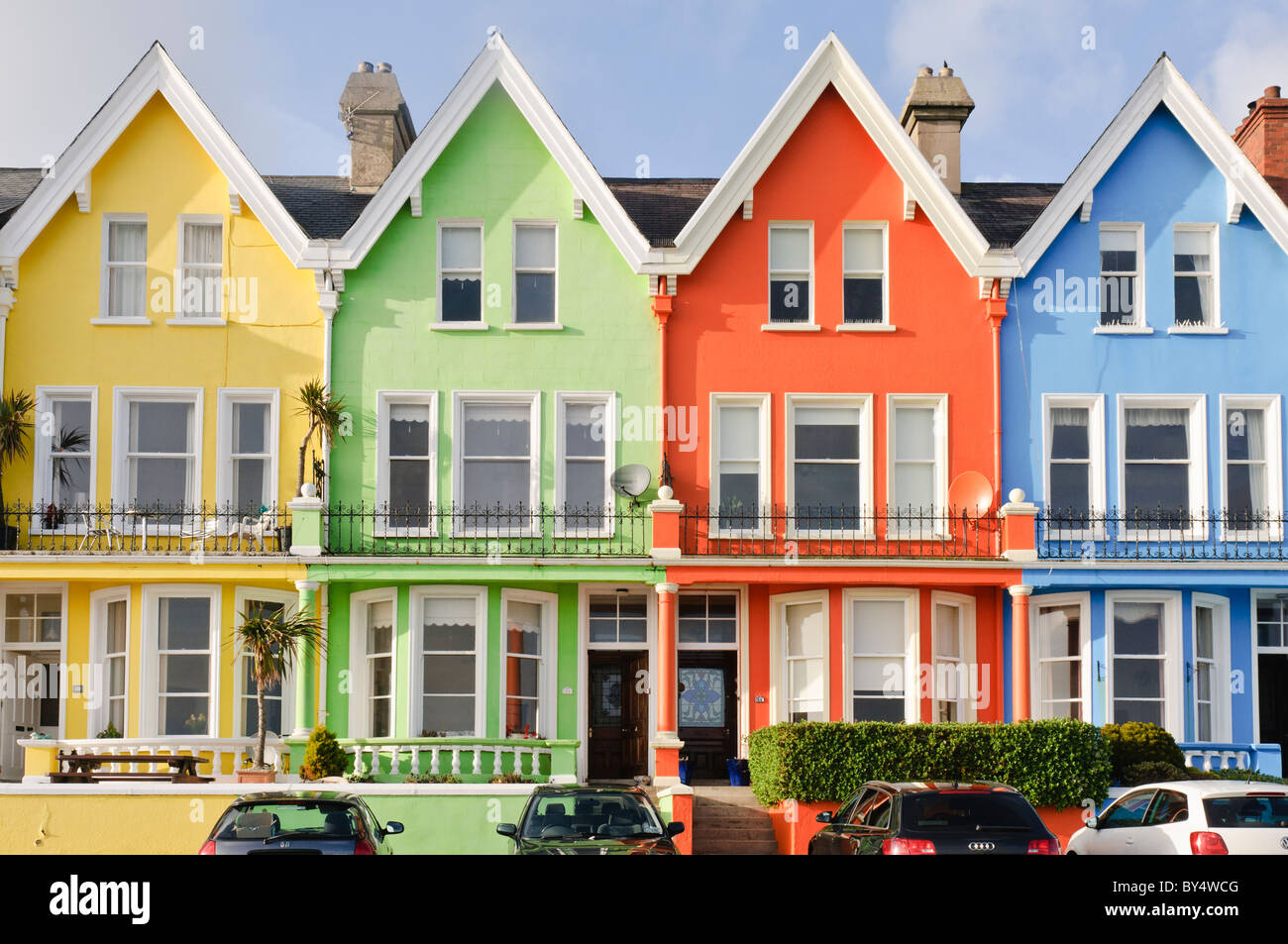 Row of brightly painted multicoloured houses in Whitehead, Northern ... Row of brightly painted multicoloured houses in Whitehead, Northern ...