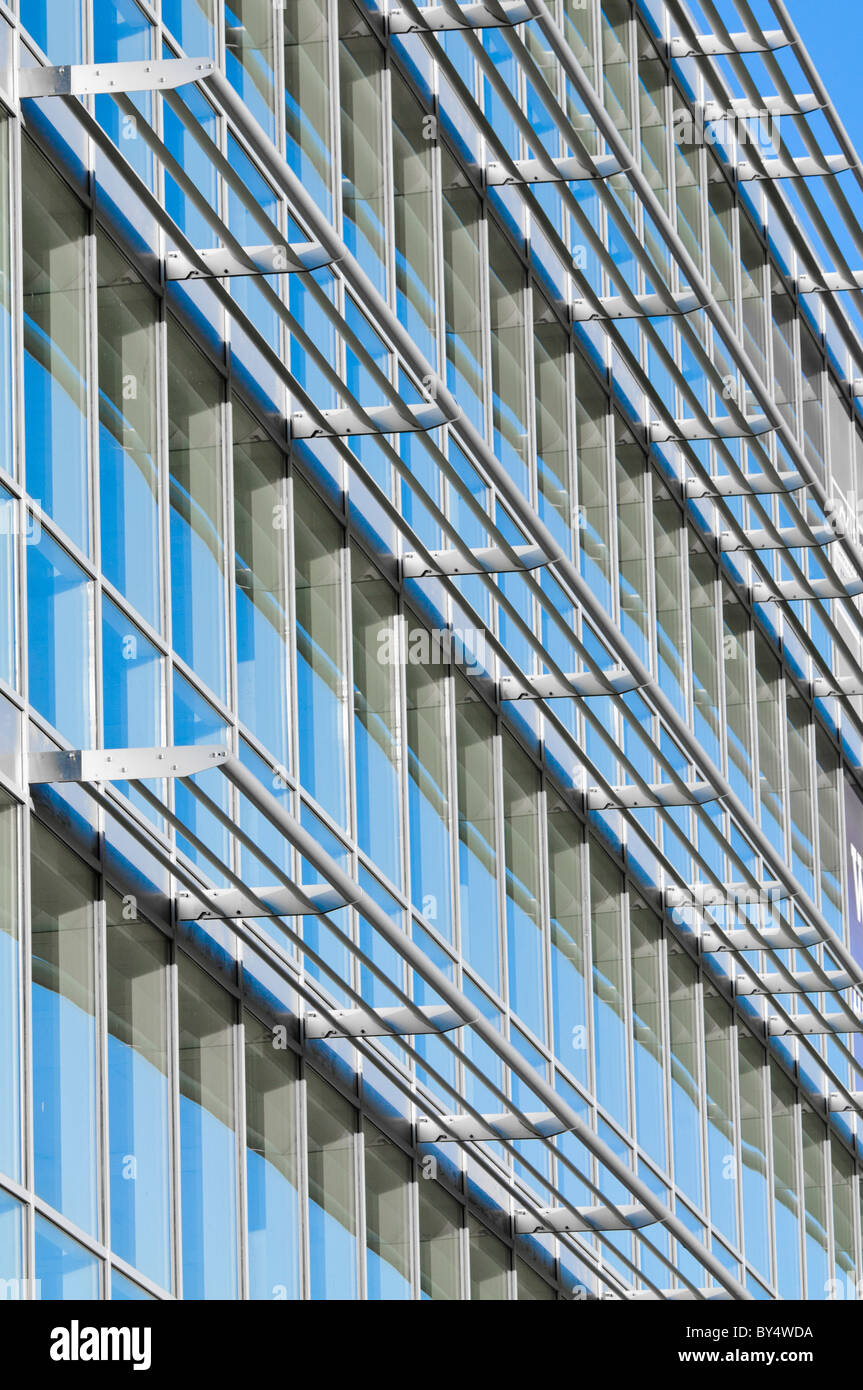 Windows of a tall office and apartment block Stock Photo - Alamy
