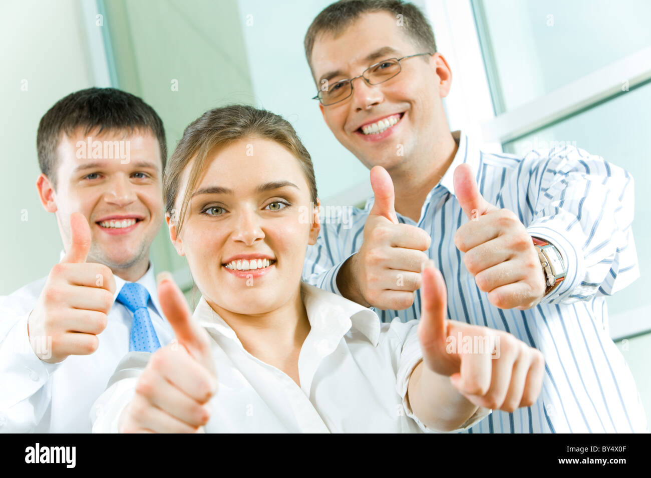 Image of business people showing sign of okay Stock Photo - Alamy