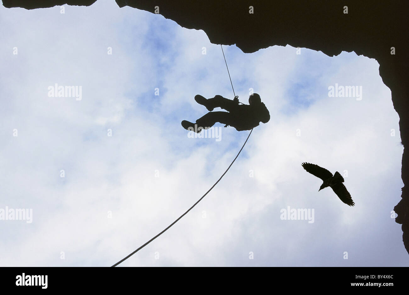 A man abseiling in Rydal Cave in the Lake District UK Stock Photo - Alamy