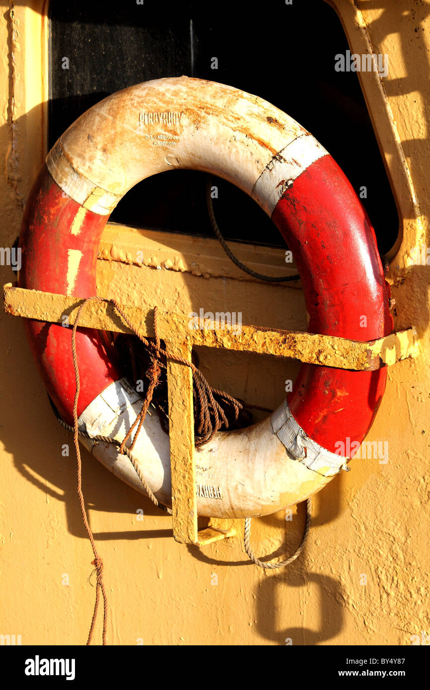 A life ring on a boat there for safety and as an aid to help a person ...