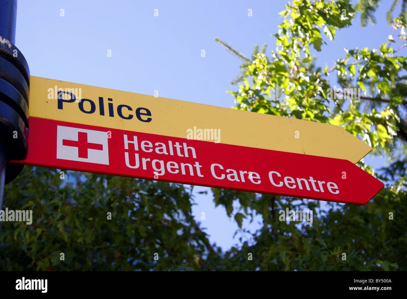 Police and Health Care Centre sign Stock Photo - Alamy