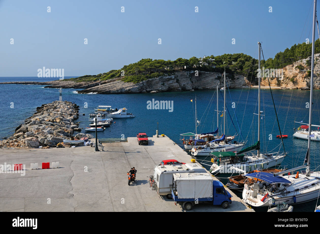 Entrance to Patitiri harbour and port on the Greek Island of Alonissos ...