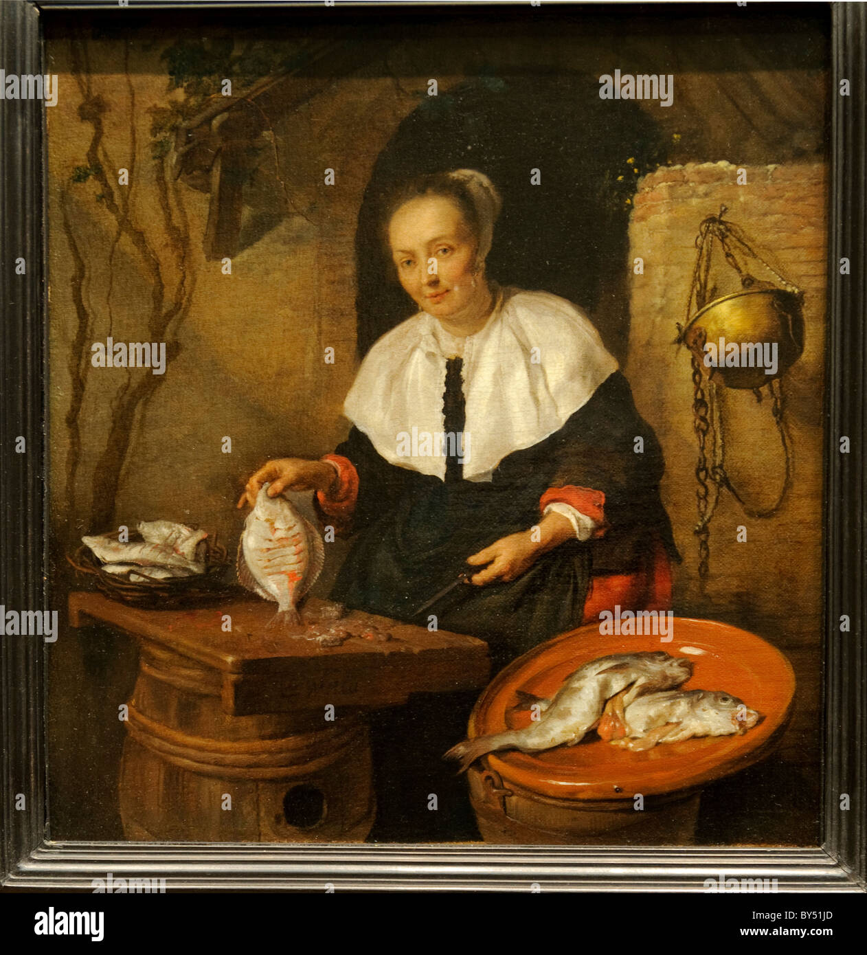 Woman cleaning fish hi-res stock photography and images - Alamy