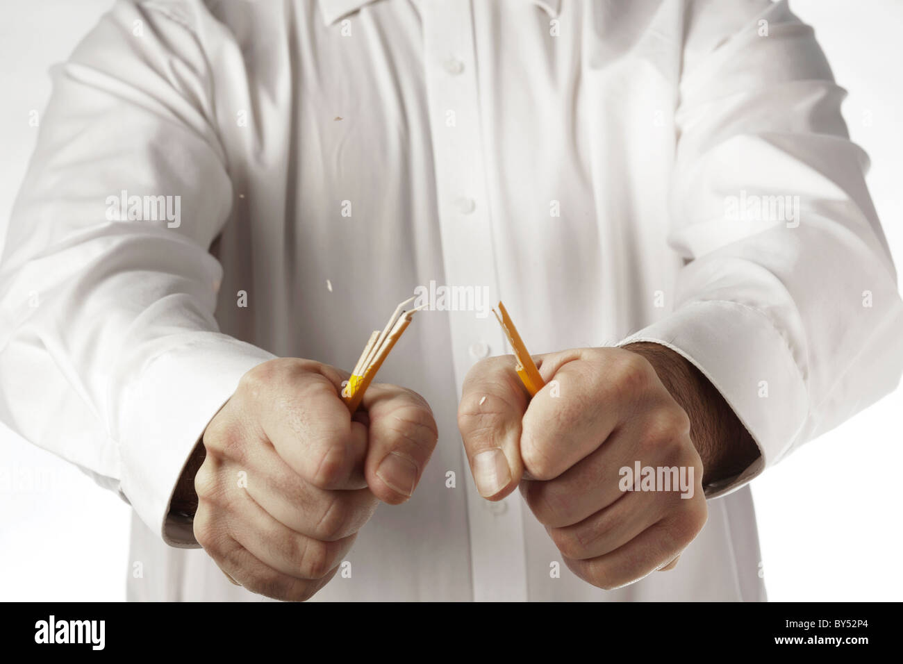 Hands breaking pencil hi-res stock photography and images - Alamy
