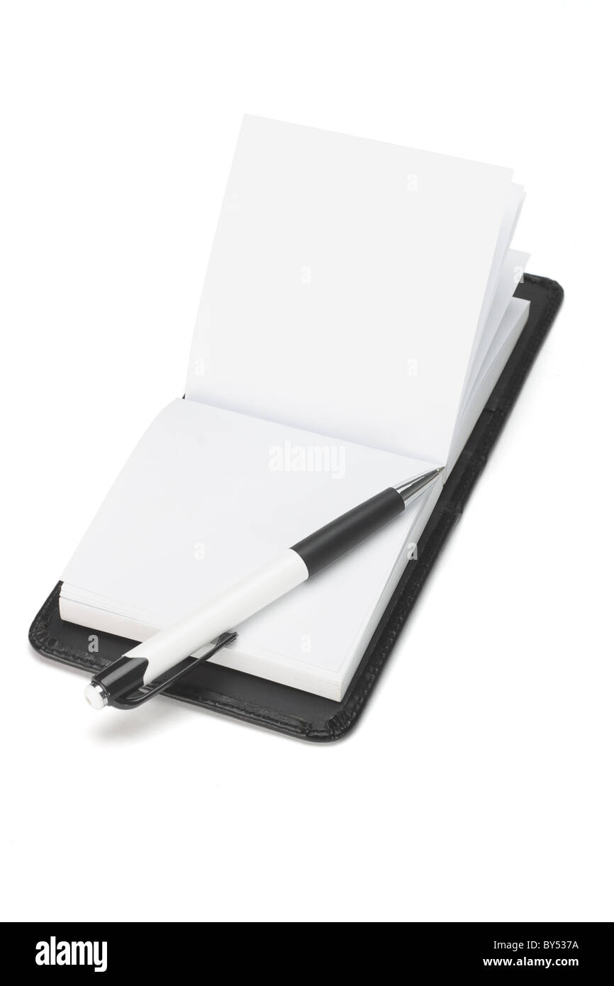 Ball point pen and open note pad on white background Stock Photo - Alamy