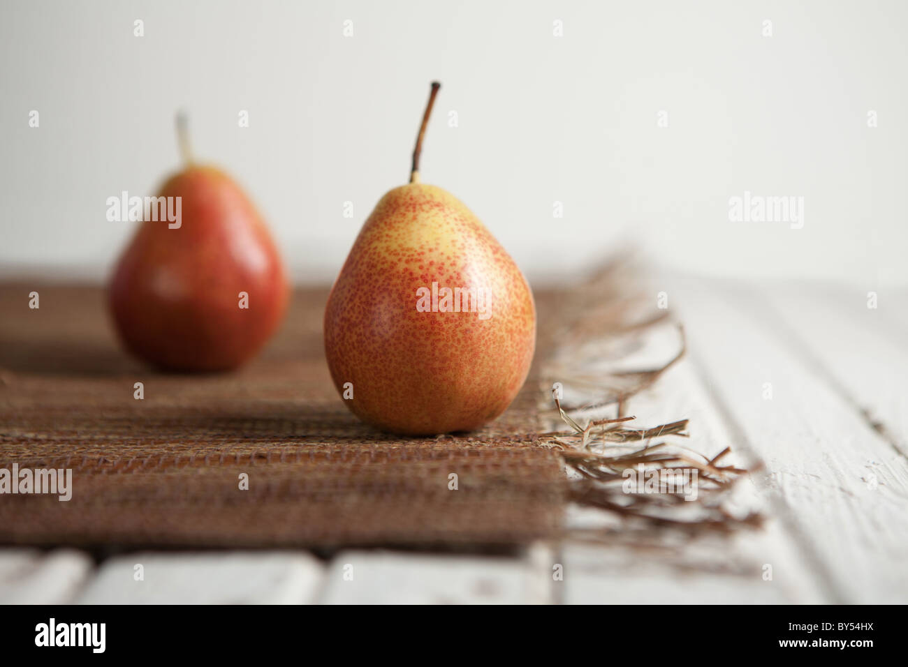 Two forelle pears in a simple environment Stock Photo - Alamy