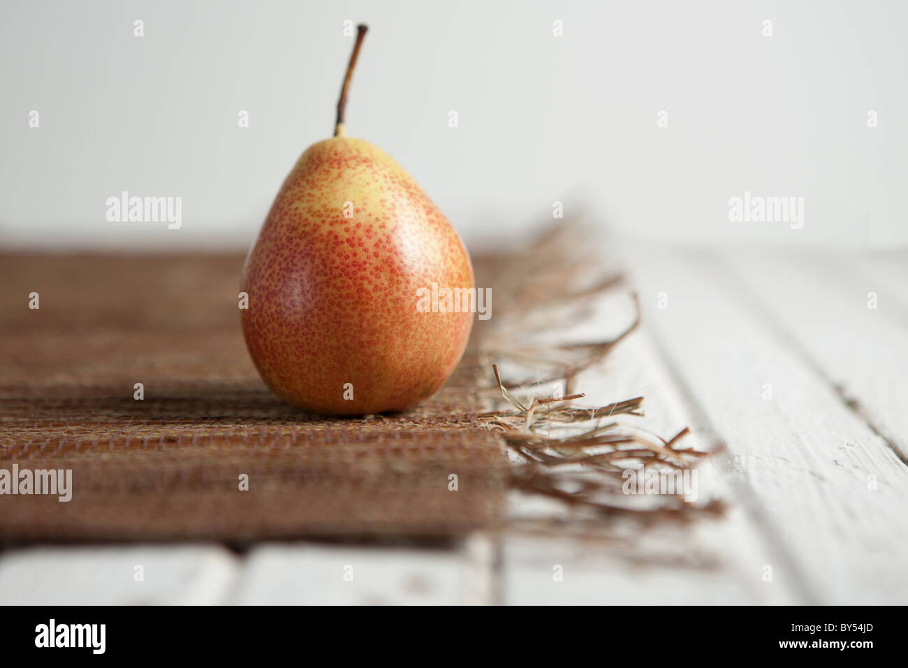 A single forelle pear in a simple environment Stock Photo - Alamy