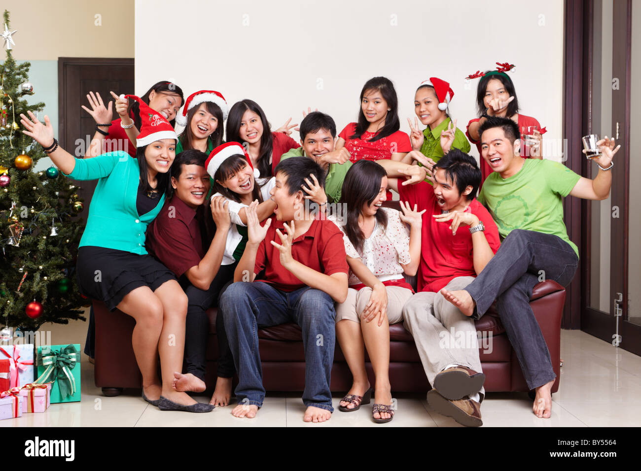 Christmas group photo shot of Asian young people Stock Photo - Alamy