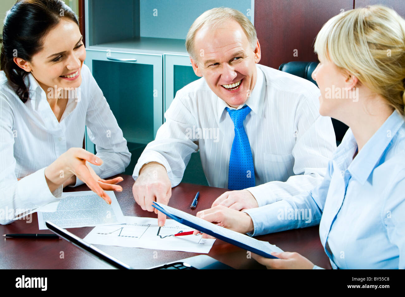 Portrait of smiling people planning business-strategy Stock Photo - Alamy