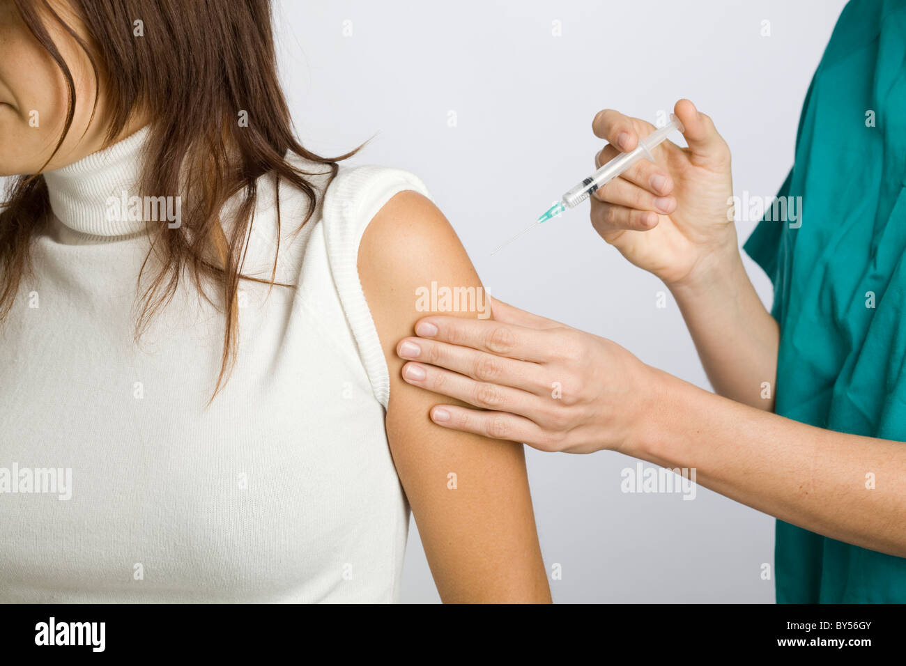 nurse administers injection Stock Photo - Alamy