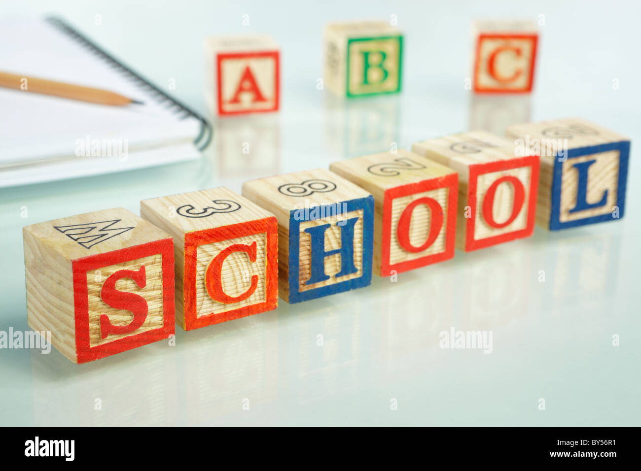 School word from wooden block, arranged with other A,B,C block Stock ...
