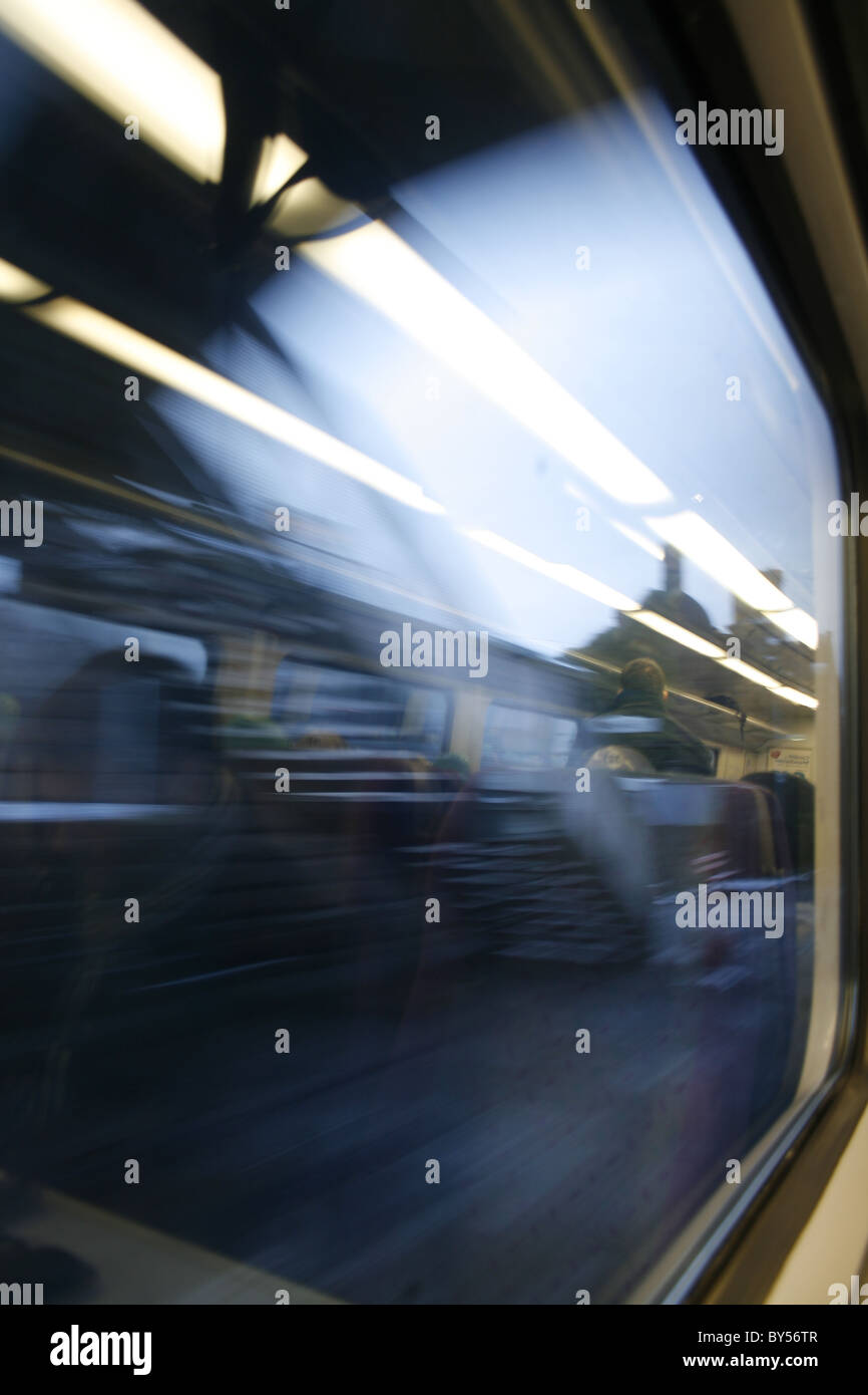 view of snow covered landscape from fast train window Stock Photo - Alamy