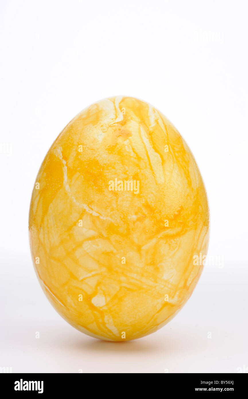 yellow easter egg isolated on white background Stock Photo - Alamy