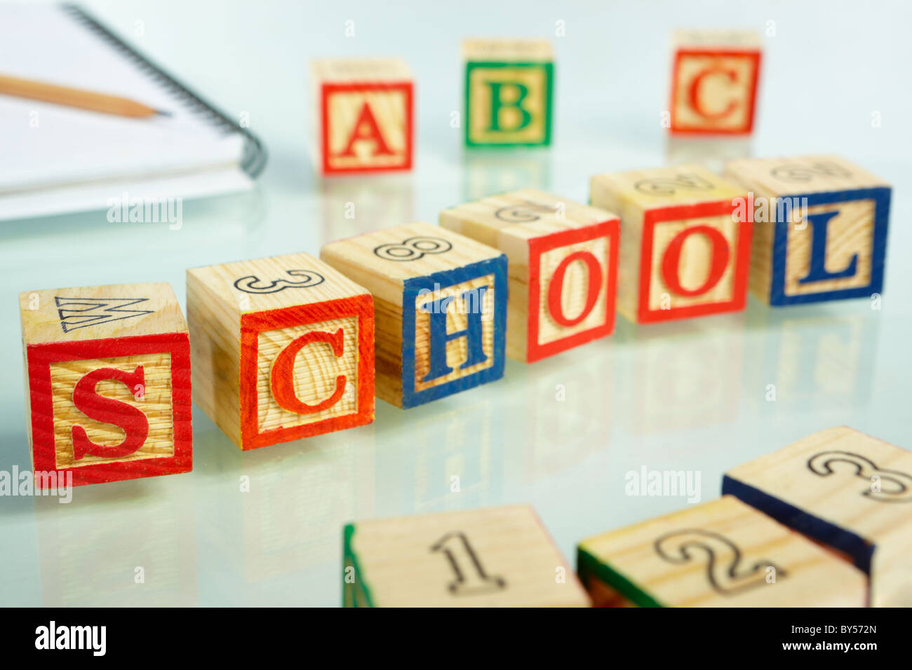 School word from wooden block, arranged with other A,B,C block Stock ...