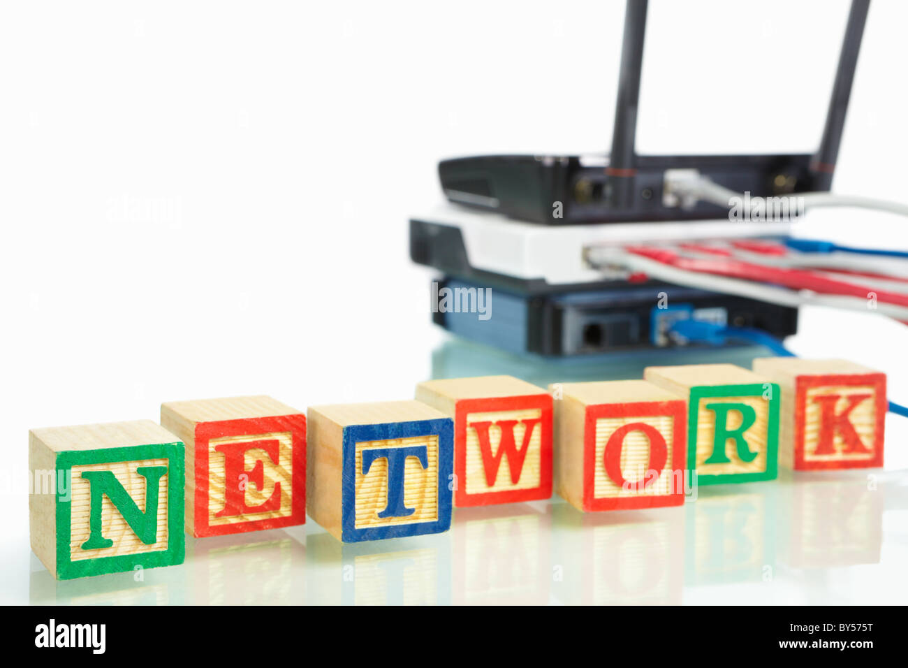 Word 'Network' in front of modem, router and witch for computer ...