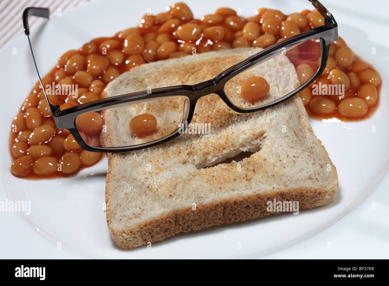 baked beans toast bread funny face glasses Stock Photo - Alamy