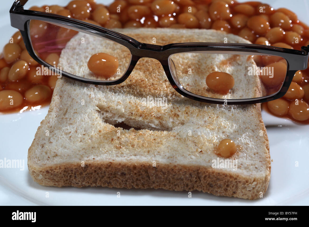 baked beans toast bread funny face glasses Stock Photo - Alamy