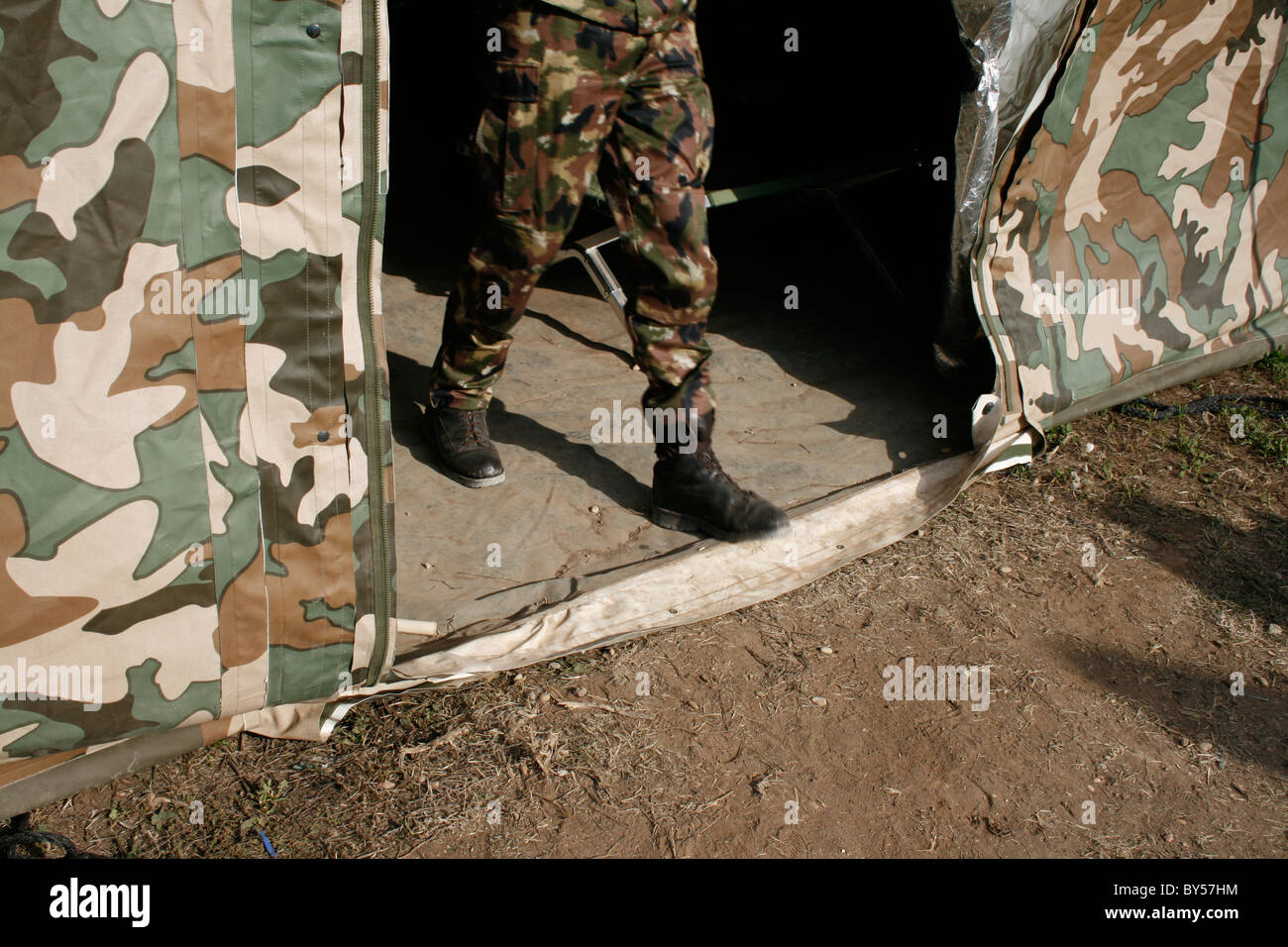 camouflage military army base tent at open day Stock Photo - Alamy