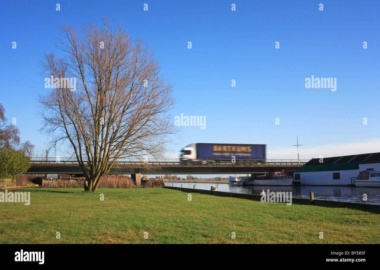 The A149 road bridge with traffic over the River Thurne at Potter ...
