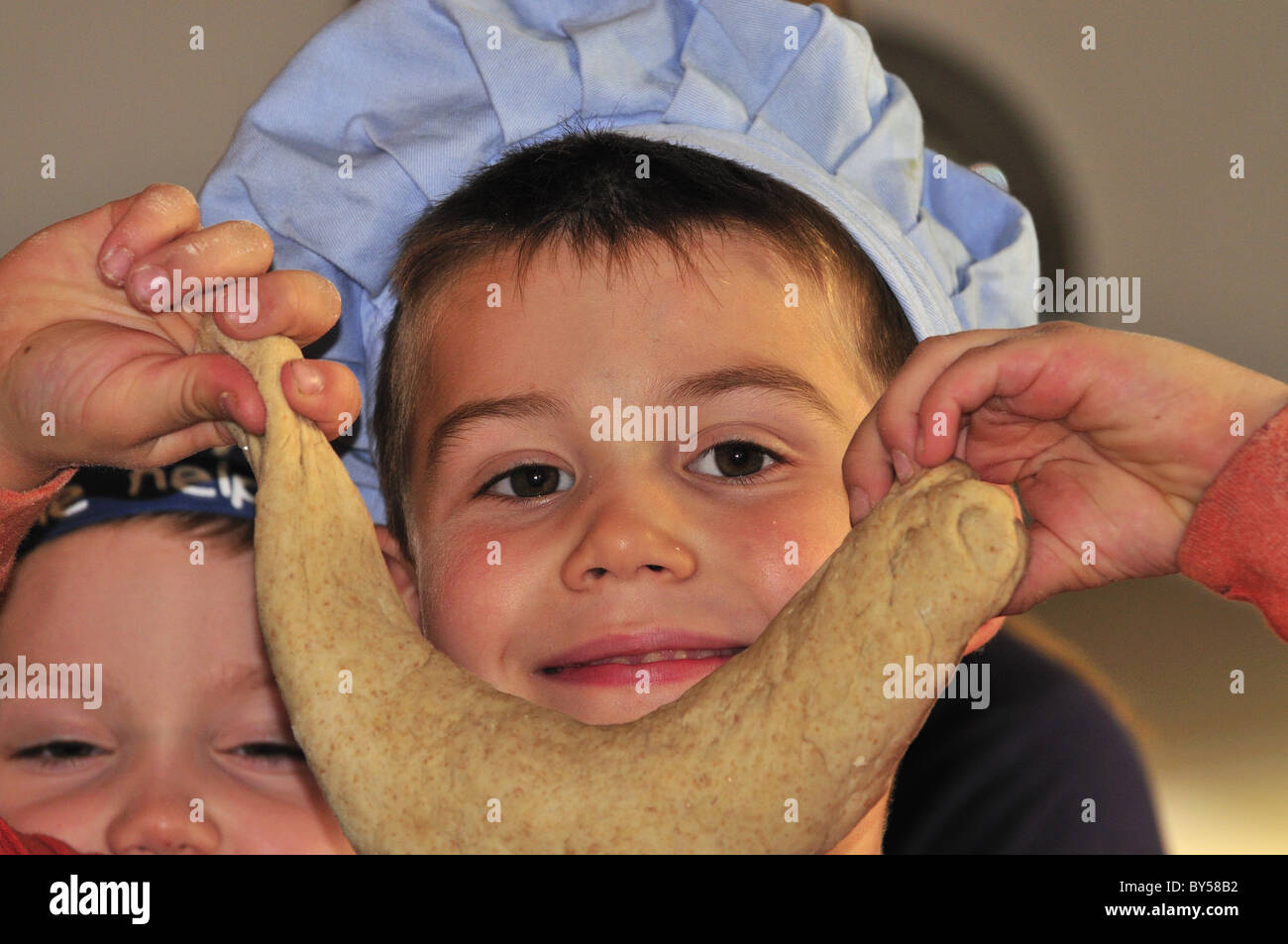 Two brothers ,Boys,Cooking bake Playing Stock Photo - Alamy