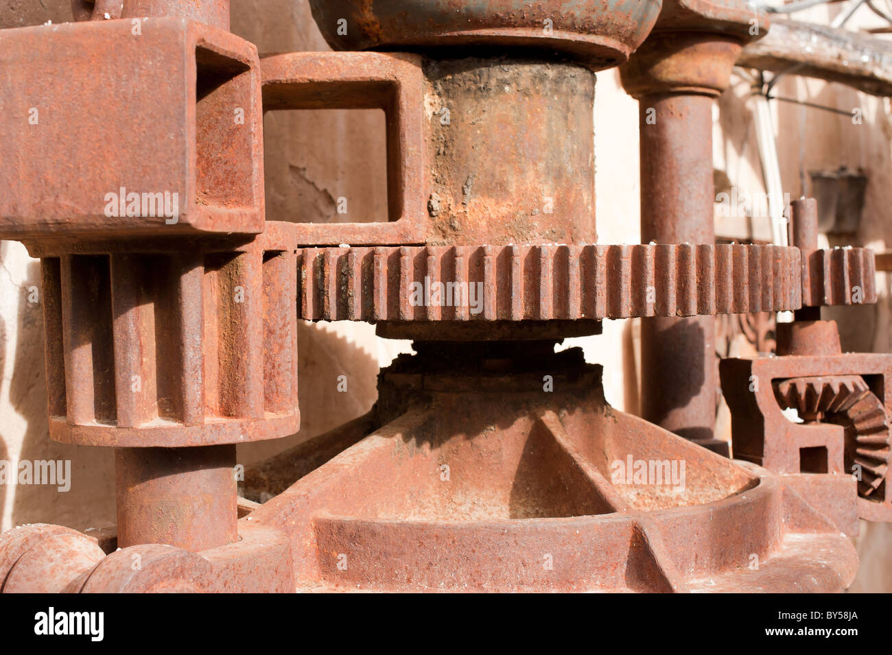 The mechanism of a vintage olive oil mill Stock Photo - Alamy