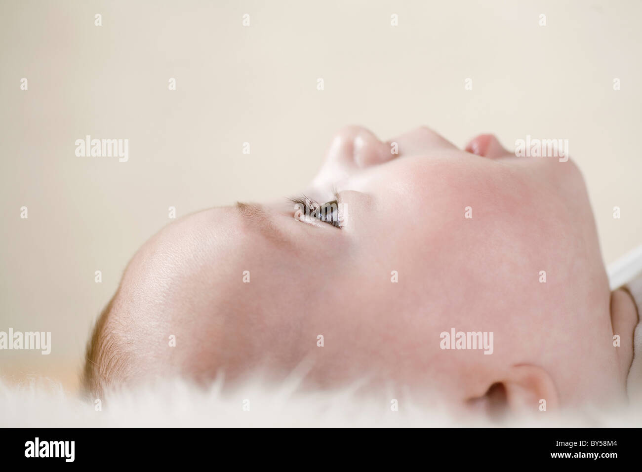 A baby looking up Stock Photo - Alamy