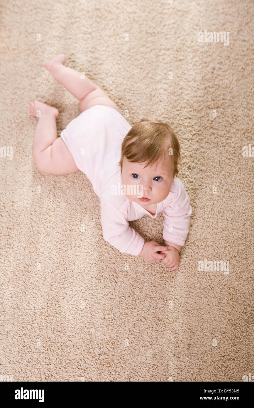A baby looking up, portrait Stock Photo - Alamy