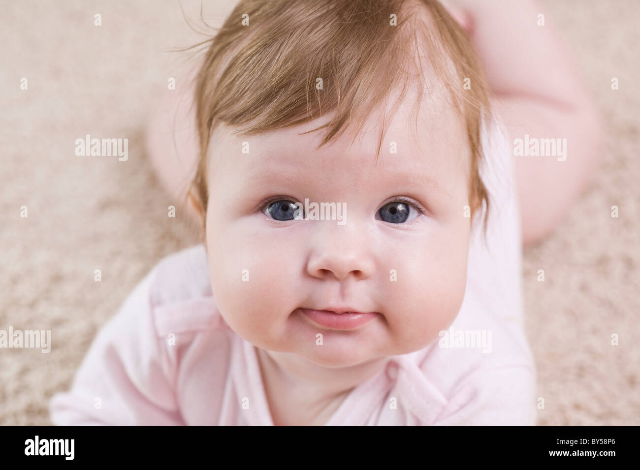 A baby looking at camera, portrait Stock Photo - Alamy